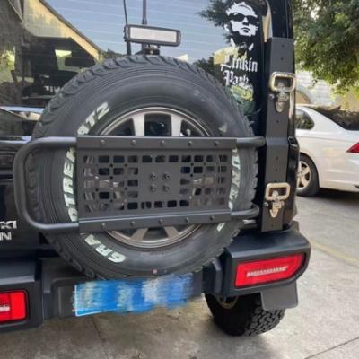 China Adjustable Rear Spare Tire Bracket Tactical Plate for Suzuki Jimny 18-26 3/5 Door Spare Tire Carrier & Cover for sale