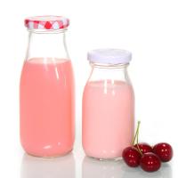 China Custom Printed Recycled Glass Milk Bottles 1l Clear Transparent for sale