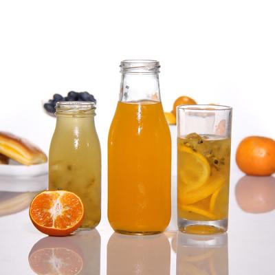 China 500ml Clear Juice Bottle Airtight Glass Juice Containers Decal Printing for sale