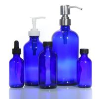 China 50ml 100ml Mini Amber Glass Lotion Bottles Soap Dispenser Bulk for sale