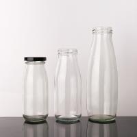 China Free Sample 100Ml 200Ml 350Ml Pasterurization Cold Brew Tea Milk Glass Bottles With Metal Lid for sale