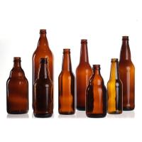 China Wholesale Empty 330ml 33cl 12oz Soda Or Juice Clear Beer Glass Bottles With Lid for sale