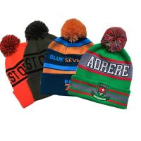 China 62cm Knitted Pom Beanie Hat Acrylic Cuff Knitted Jacquard Beanie Caps for sale