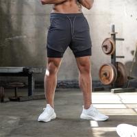 China Elastic Waist Compression Workout Shorts Male Mesh Athletic Shorts With Pockets for sale
