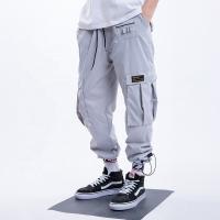 China Windbreaker Waterproof Sportswear Joggers Nylon Running Pants for sale