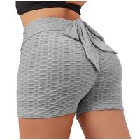China Quick Dry High Waist Yoga Sports Workout Shorts Bow Tie Textured Butt Lifting for sale