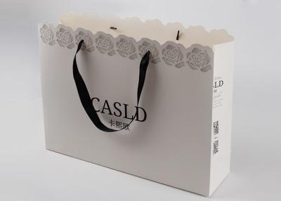 China Laser Cut Printing Personalised Paper Bags , Grosgrain Ribbon Plain Gift Bags for sale
