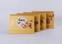 China Cute Classic Spiral Desk Calendar Art Paper Material And Gold Hot Foil Stamp for sale