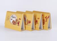 China Cute Classic Spiral Desk Calendar Art Paper Material And Gold Hot Foil Stamp for sale
