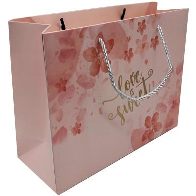 China Pantone Matte Printed Paper Bags Embossing Offset 250gram With Twisted Handles for sale