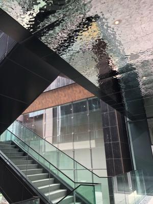China Water Wave Shaped Stainless Steel Sheets Gold Mirror Finish For Hotels Villa Lobby Interior Decoration for sale