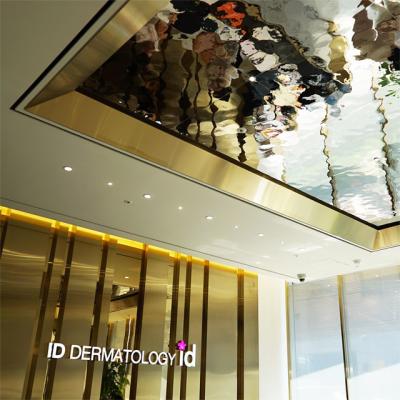 China 304 316 201 mirror polished silver gold champagne colored booming steel molded mirror stainless steel rippled sheet for for sale