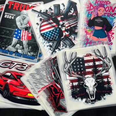 China Custom DTF Heat Press Transfer Sticker PET Material Iron On Label for Garment Printing 22 Inch for sale