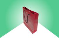 China Strong Bottom Paper Shopping Bags With Handles Customized Logo for sale
