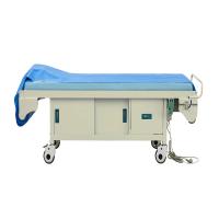 China Automatic Hospital Patient Bed Sheet Changing Examination Couch With Cabinet ODM durable medical equipment for sale