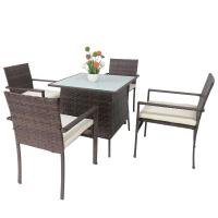 China Factory 2027 Hot Sale 1 Piece Table 4 Pieces Chairs  Garden Rattan Dining Set Tempered Glass Table Top for sale