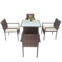 China Factory 2027 Hot Sale 1 Piece Table 4 Pieces Chairs  Garden Rattan Dining Set Tempered Glass Table Top for sale
