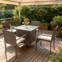 China Factory 2027 Hot Sale 1 Piece Table 4 Pieces Chairs  Garden Rattan Dining Set Tempered Glass Table Top for sale