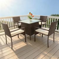 China Factory 2027 Hot Sale 1 Piece Table 4 Pieces Chairs  Garden Rattan Dining Set Tempered Glass Table Top for sale
