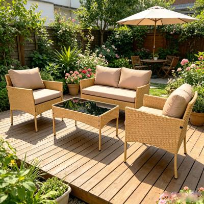 China 4 Pieces PE Rattan Patio Furniture Set, Outdoor Garden Sofa Set with Waterproof Cushions and Glass Coffee Table for Backyard for sale