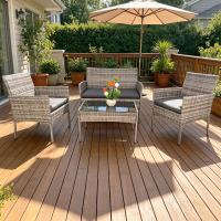 China Four Pieces Patio PE Rattan Wicker Furniture Set Outdoor Garden Conversation Sofa Set with Gray Cushions Glass Top Coffee Table for sale