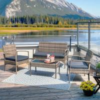 China Modern 4-Piece Outdoor Wicker Rattan Sofa Set All-Weather Patio Conversation Furniture Chairs With Coffee Table for sale