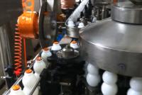 China Small PET Bottle Milk Filling Aluminium Foil Sealing 2 in 1 Machine 4000-5000 BPH for sale