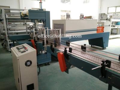 China Automatic PET Bottle Shrink Wrap Machine with Shrink Oven 220V 50Hz for sale