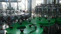China Automatic 3-in-1 Glass Bottle Juice Filling Machine 2000-3000 BPH Vacuum Filling for sale