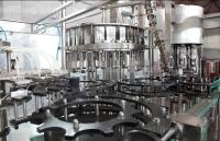 China 3 in 1 Glass Bottle Filling Machine 60-60-15 25000-28000 BPH Pure Mineral Water Bottling Line for sale