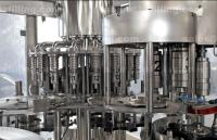 China Carbonated Drinks Rotary Bottle Filling Machine 32 Heads High Speed 12000 BPH for sale