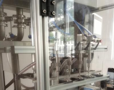 China Linear Chili Sauce Filling Machine 4-16 Heads 200-2500ml Bottles 400-3000 BPH for sale