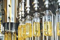 China Automatic Liquid Volumetric Filling Machine for PET Bottles 1-5L 500-2000 BPH for sale