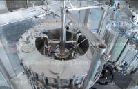 China 3 in 1 Glass Bottle Mineral Water Filling Line 12000 BPH Non Carbonated Drinks Machine for sale