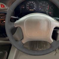 China Customized Black Genuine and Suede Hand Stitched Steering Wheel Cover for NISSAN PatrolGU 2000 for sale