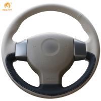 China Orange Genuine Leather Hand Sew Steering Wheel Cover for Nissan Tiida Sylphy Versa Note for sale