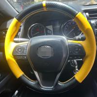 China Custom Hand Stitching Yellow Leather Carbon Steering Wheel Cover for Toyota Corolla RAV4 Avalon Camry 2018-2020 for sale