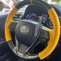 China Custom Hand Stitching Yellow Leather Carbon Steering Wheel Cover for Toyota Corolla RAV4 Avalon Camry 2018-2020 for sale