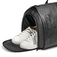 China Black PU Leather Oxford Cloth Travel Duffle Bag Accept Customized Logo for sale