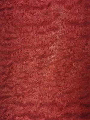 China Dyed Sapelle Pommele Wood Veneer 0.42mm Thickness 10cm Width Red for Interior Design for sale