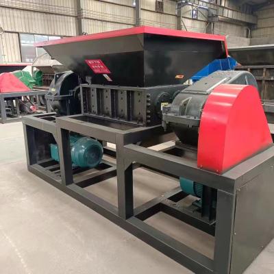 China Waste Tyre Crusher Shredder Machine 50-150mm Output with 75Kw×2 Power and Low RPM for Rubber Recycling for sale
