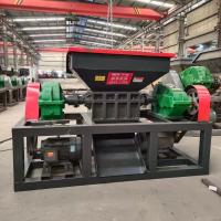 China Waste Tyre Crusher Shredder Machine 50-150mm Output with 75Kw×2 Power and Low RPM for Rubber Recycling for sale