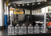 China 100ml 200ml Complete Bottled Water Production Lines PETG Bottle Blow Molding Machine for sale