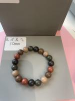 China Xi Ji Wan Brown Wood Bracelet Skin Nourishing Pill Bracelet With Fragrant for sale