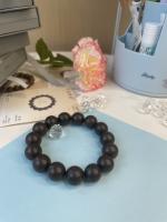 China Classic Chinese Style Goose Feather Green Agarwood Bracelet with Calming and Regulating Buddhist Beads for sale