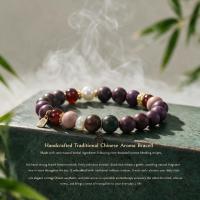 China Classic Chinese Style Goose Feather Green Wood Beaded Bracelet with Calming and Regulating Buddhist Beads Bracelet for sale