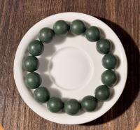 China Traditional Wooden Saints Charm Prayer Bracelets Improved Eyesight Calming Beads for sale