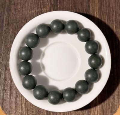 China Buddhist Green Wood Ball Bracelet Clove Herbal Diy Wood Bead Bracelet With Mugwort for sale