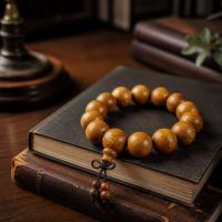 China Handmade Golden Nanmu Wood Taoist Bracelet with 14 Beads and Silky Grain for Meditation for sale