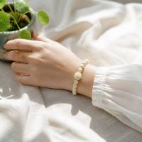 China Natural Bodhi Root Taoist Bracelet with Hand-Carved Lotus Beads in Ivory White for Meditation for sale